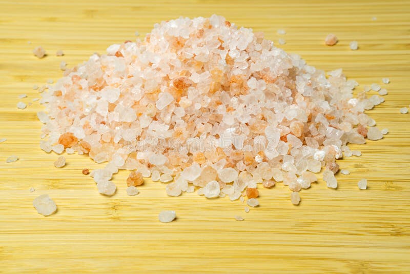 Heap of Himalayan Pink Salt on Bamboo Table. Large Crystals of Rock ...