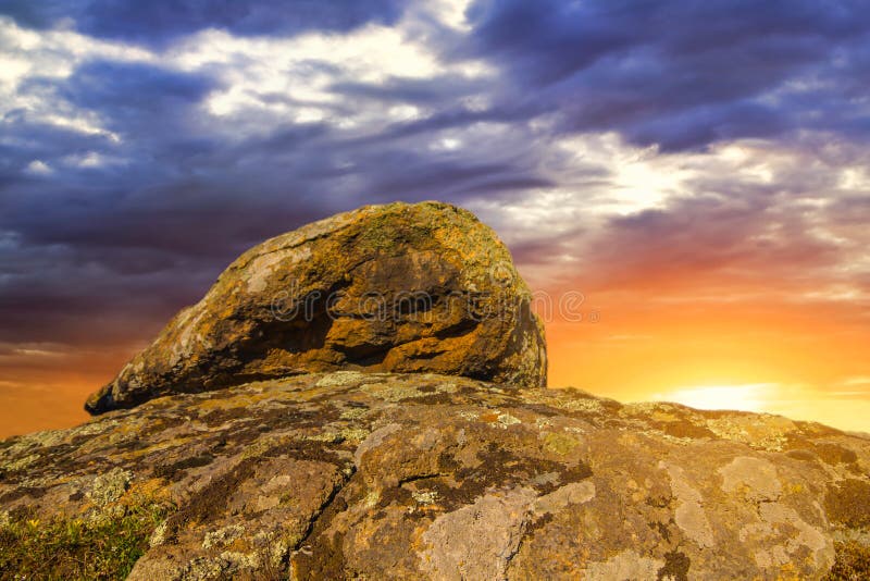 Huge stones at the sunset stock photo. Image of solar - 259645352