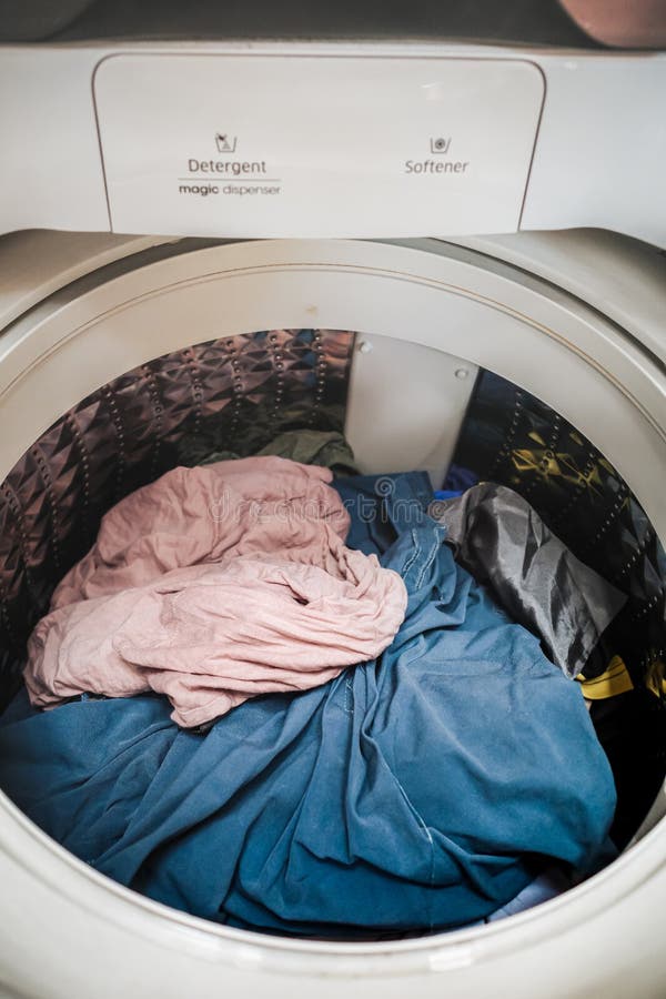 Heap of Laundry Inside of Top Loading Washing Machine Stock Photo ...