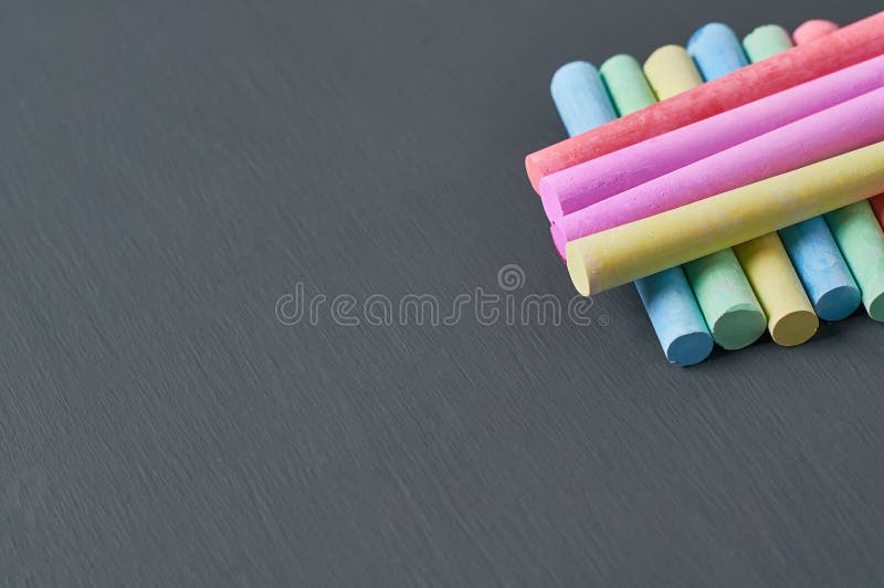 Heap of Many Colorful Pieces of Chalk on Black Chalkboard Stock Photo ...