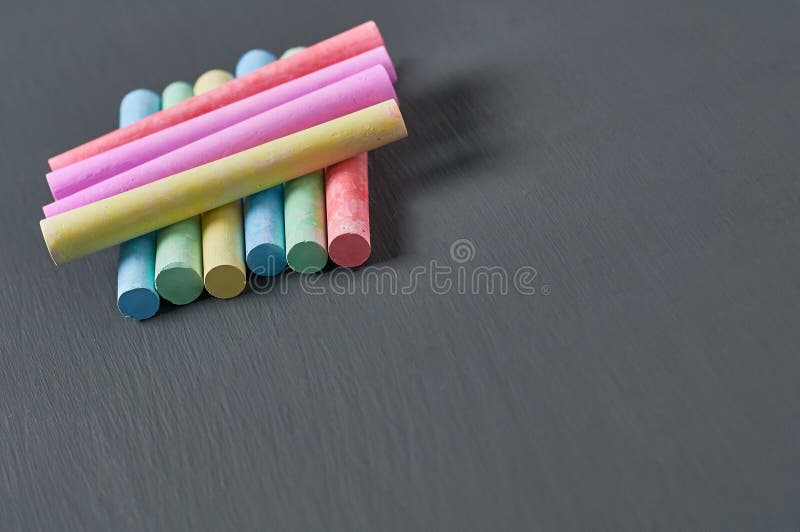 Heap of Many Colorful Pieces of Chalk on Black Chalkboard Stock Photo ...