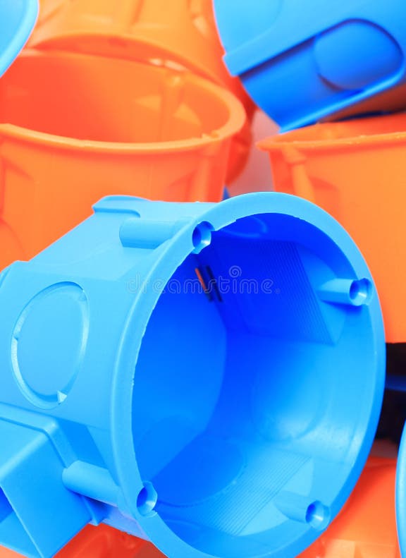 Heap of Orange and Blue Electrical Boxes Stock Photo - Image of plastic ...