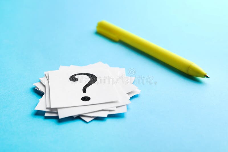 Heap of Paper Notes with Question Marks and Pen on Blue Background ...