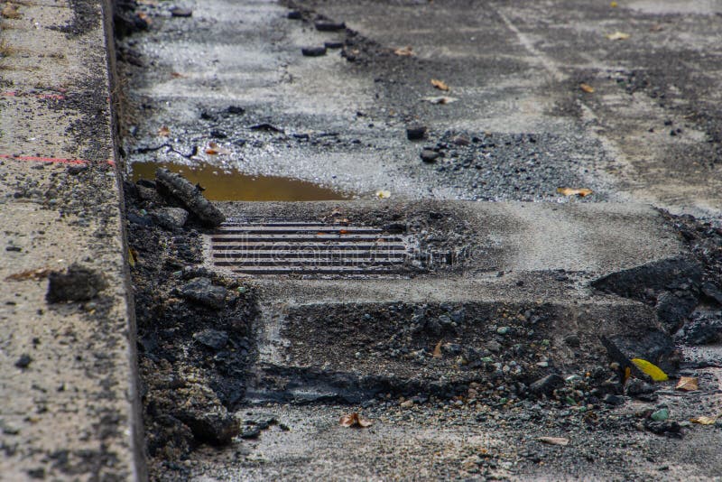 Heap of Pieces of Pavement and a Gutter after a Road Milling Stock ...