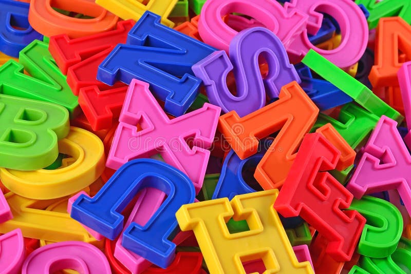 Heap of Plastic Colorful Alphabet Letters on a White Stock Image ...