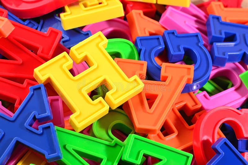 Heap Of Plastic Colorful Alphabet Letters On A White Stock Image ...