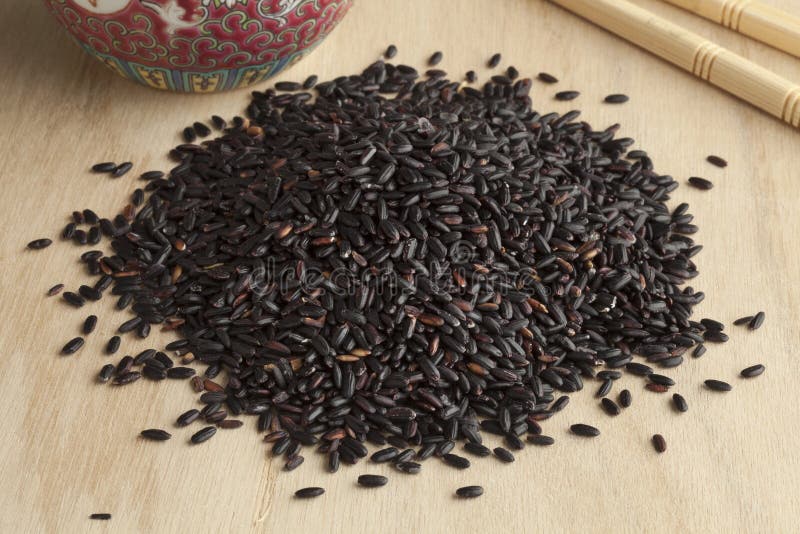 Heap of raw black rice stock photo. Image of unmilled - 58424472