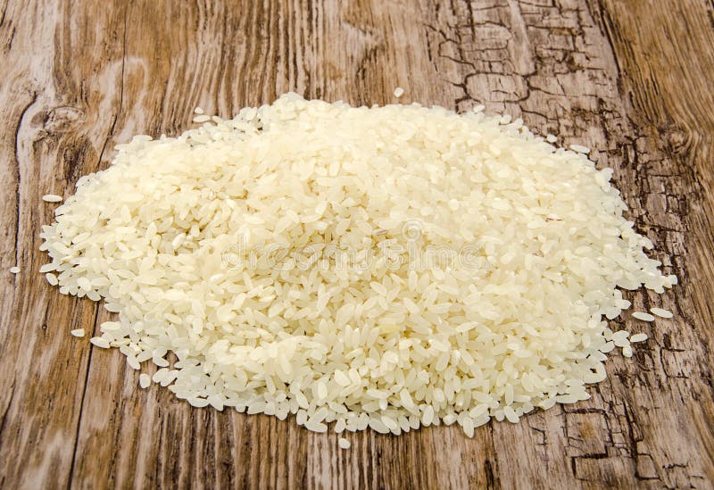 Heap of Rice Grain on Wooden Floor in a Jute Bag Stock Image - Image of ...
