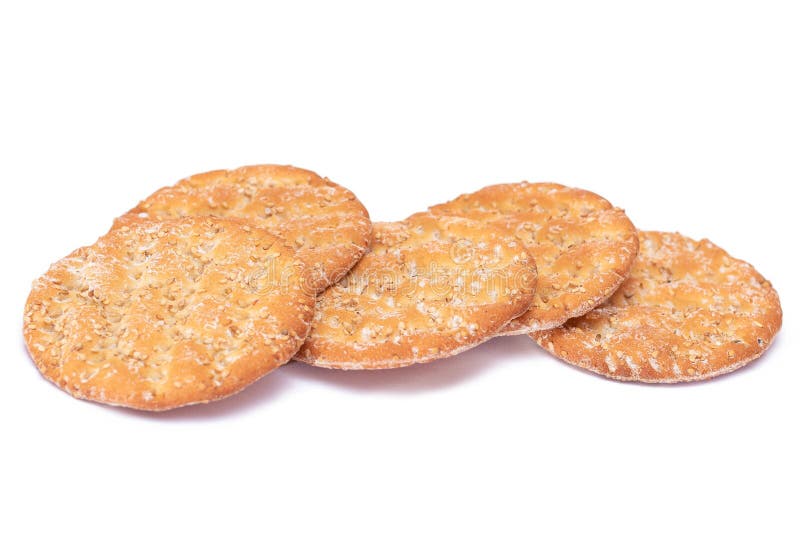 A Heap of Round Salt Crackers with Sesame on White Background Stock ...