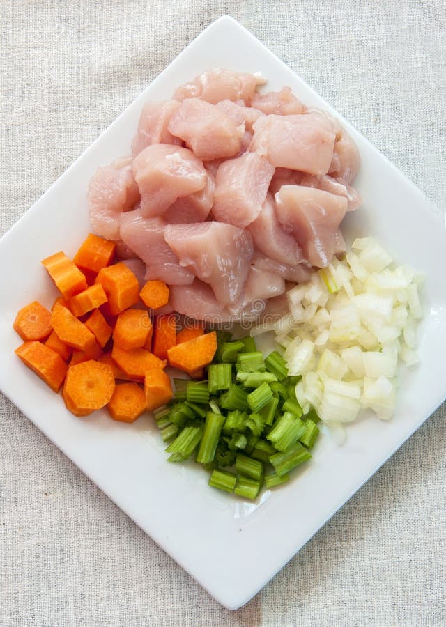 Raw Chicken Small Pieces Close Up on Wooden Background Stock Photo ...