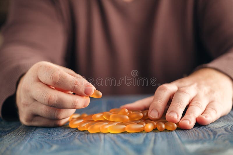 Heap of Softgel Fish Oil in Man Hands Stock Image - Image of fish ...