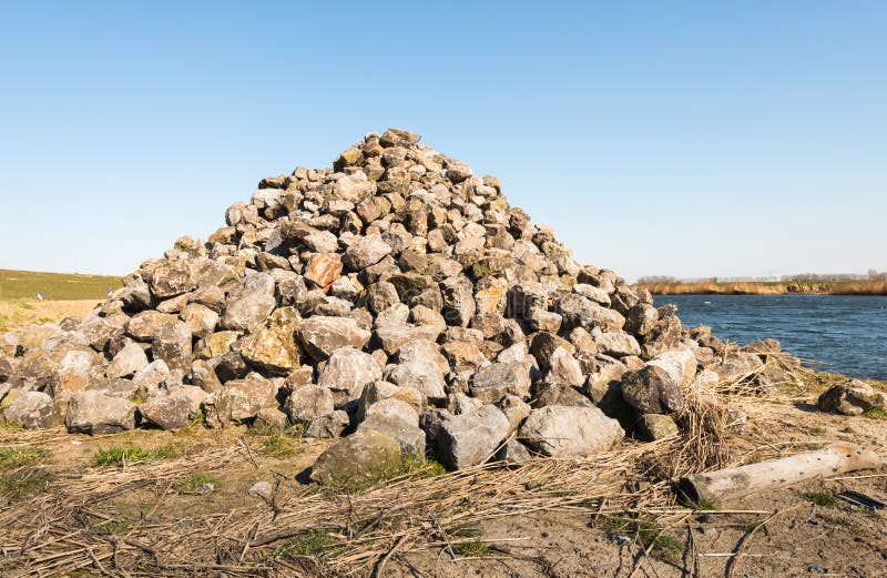 Heap of Stones Along a River Stock Photo - Image of heap, bank: 30402662