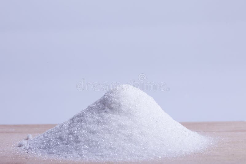 Heap of sugar or salt stock photo. Image of closeup - 209559126
