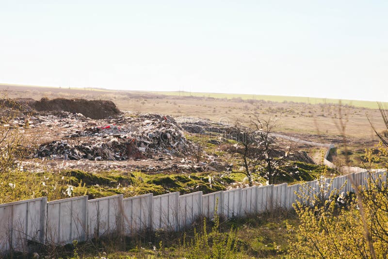 Heaps of Garbage in a Landfill Stock Photo - Image of fence, horizon ...