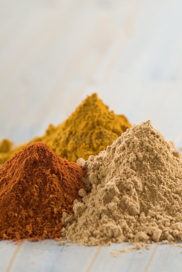Heaps of ground spices stock photo. Image of flavours - 5893588