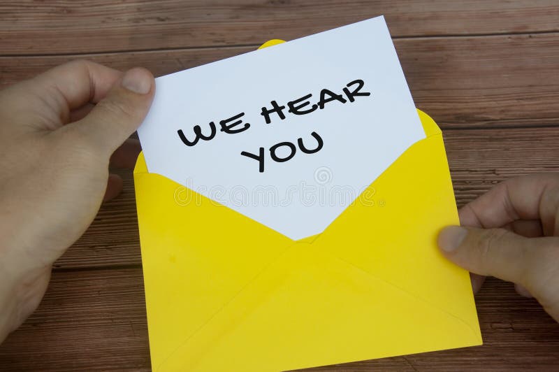 We Hear You Text on White Notepad in Yellow Envelope. Listening Concept ...
