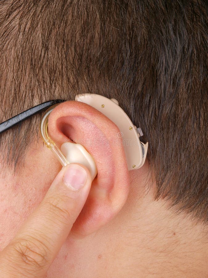 Hearing aid stock photo. Image of holding, sound, finger - 12355964