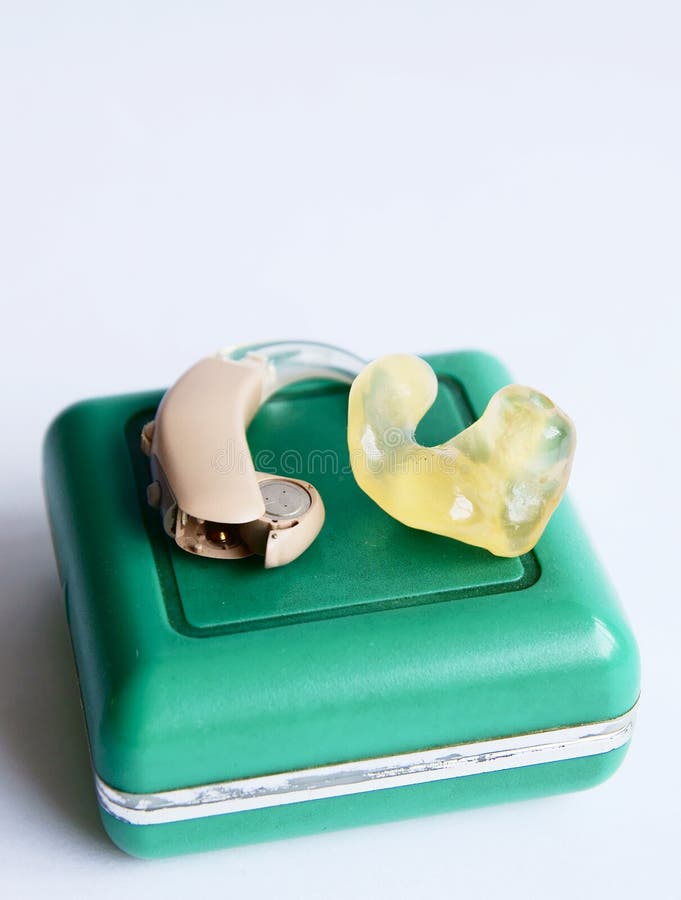 Hearing aid stock photo. Image of electroacoustic, green - 14446802