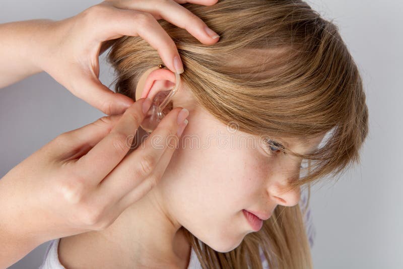Hearing Aid Fitting Process. Stock Image - Image of selection ...