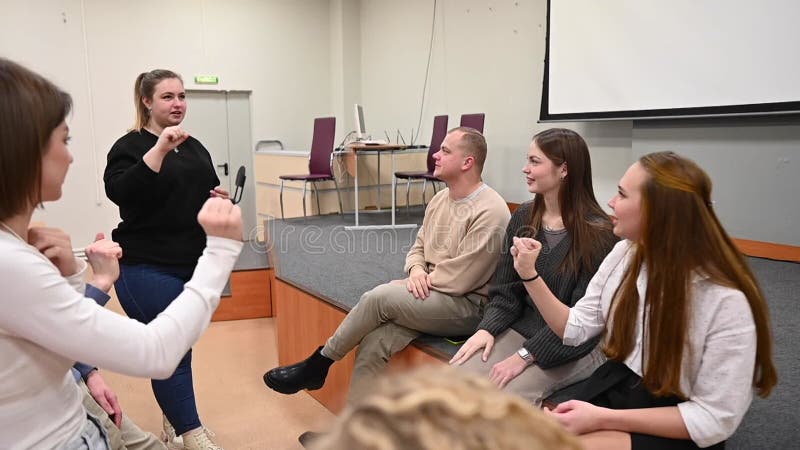Hearing Impaired Students Communicate during Breaks at the University ...