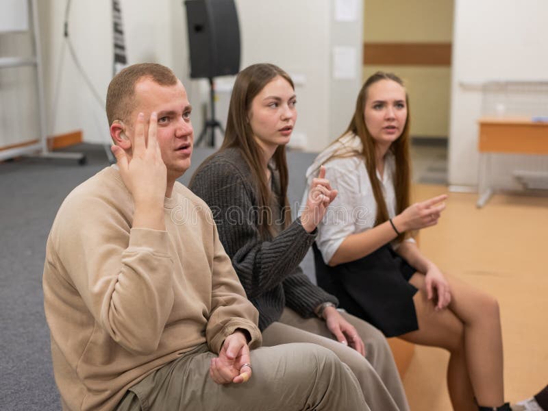 Students Communicate and Drink Tea in Cafe. Media. Young Man and Woman ...