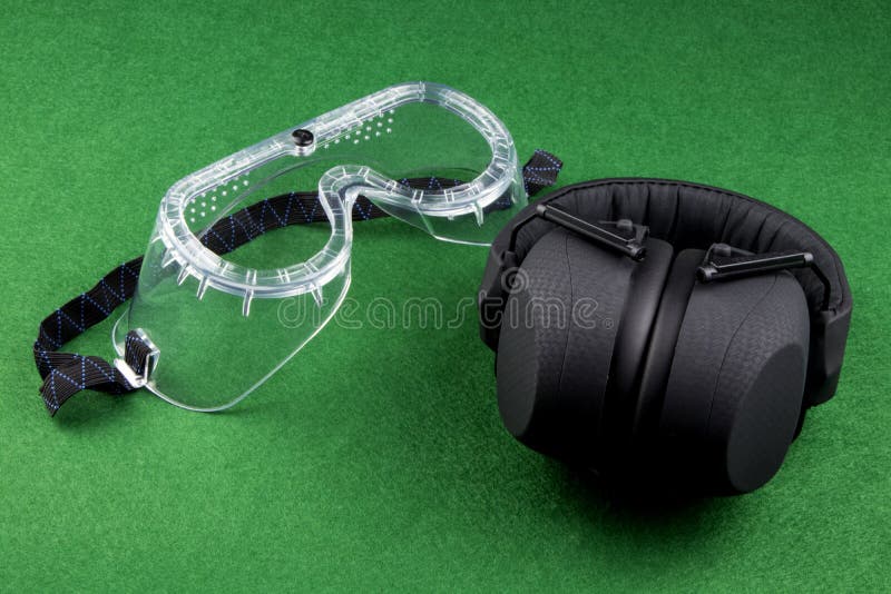 Hearing Protection and Safety Goggles on a Green Felt Table Top Stock ...