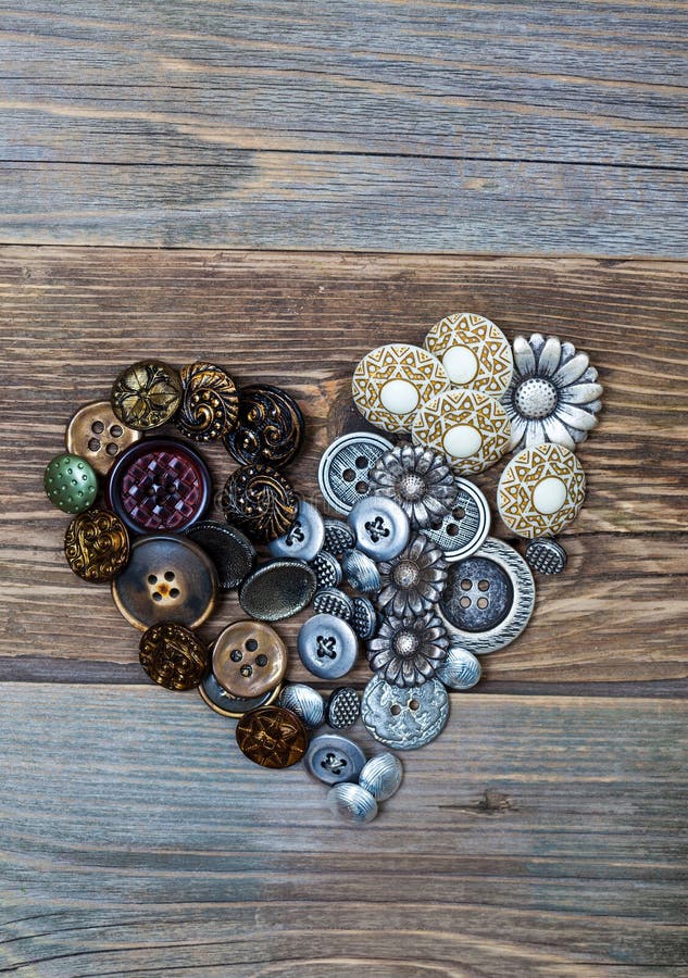 Heart from Antique Classical Buttons on the Aged Boards Stock Photo ...