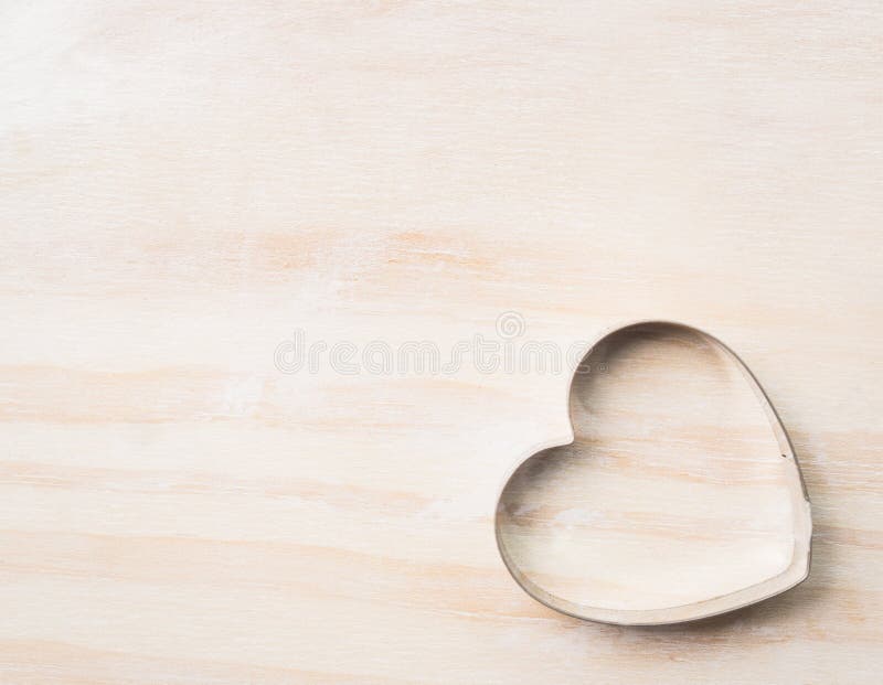 Heart Biscuit Cutter Bake Tool on White Wooden Background, Top View ...