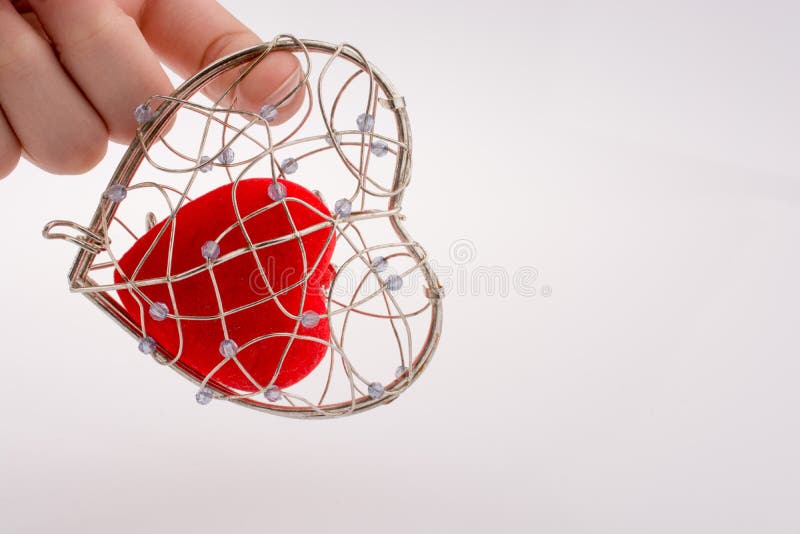 Heart in a cage stock image. Image of love, metal, cell - 145596831