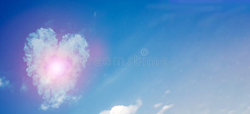 Heart of Clouds with Sun Inside in the Blue Sky Stock Image - Image of ...