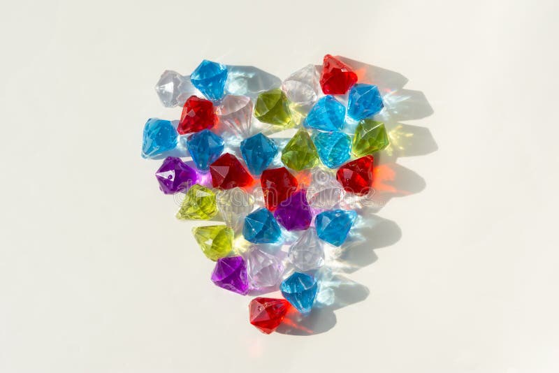 Heart of Colored Stones on a White Background. the Composition is ...