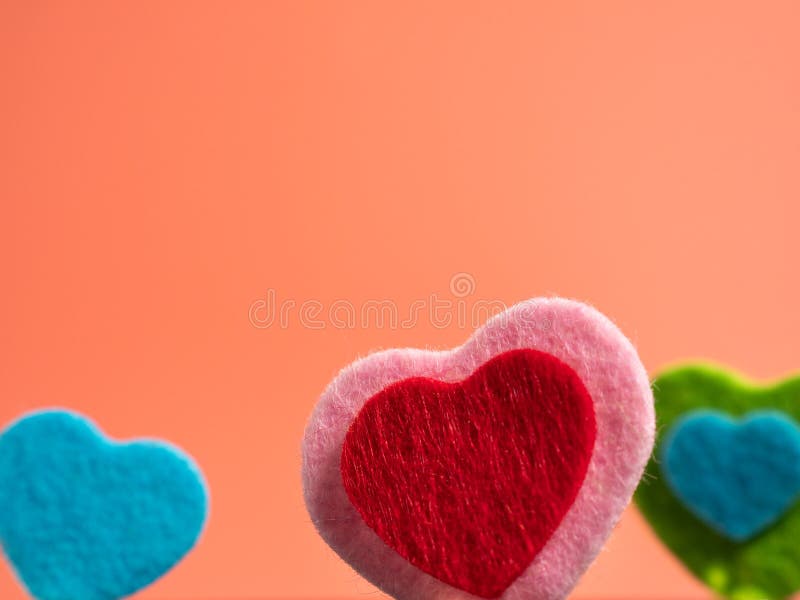 Heart of Different Colors on a Pink Background. Stock Image - Image of ...