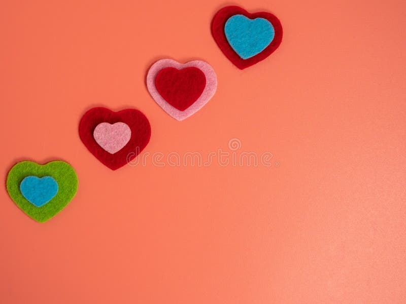 Heart of Different Colors on a Pink Background. Stock Photo - Image of ...