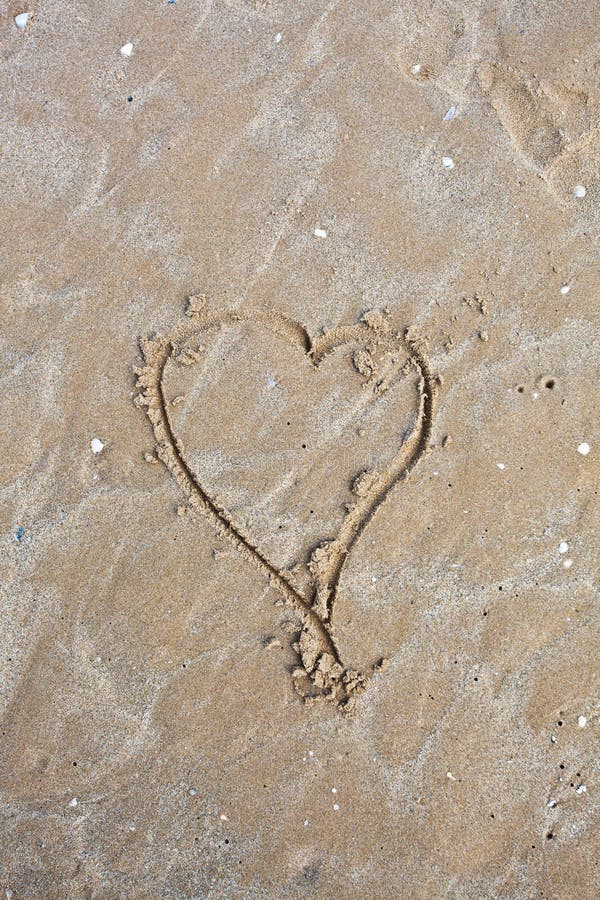 A Heart Drawn in the Sand on the Beach Stock Photo - Image of coastline ...