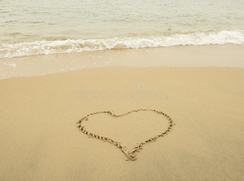Heart Drawn in the Sand on the Beach. Stock Image - Image of scene ...