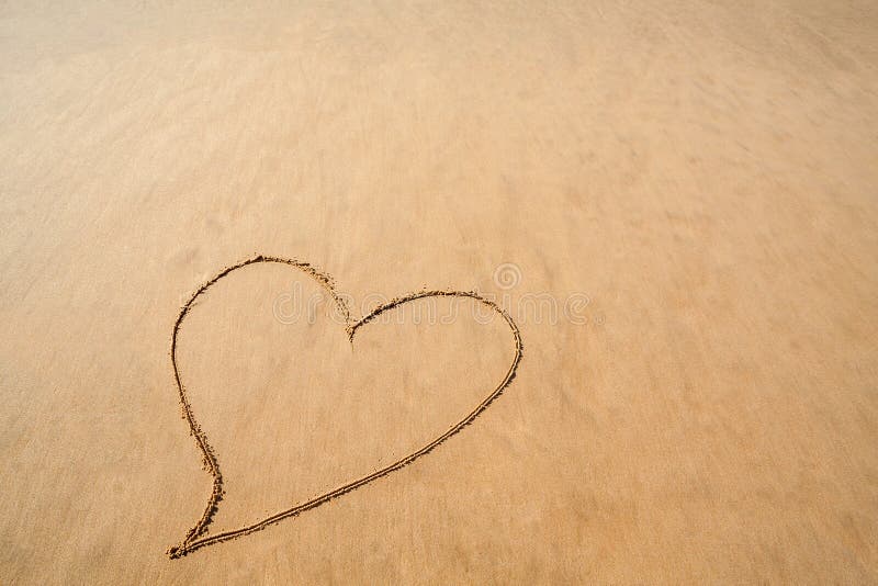 Heart Drawn in the Smooth Beach Sand Stock Photo - Image of sign, shore ...