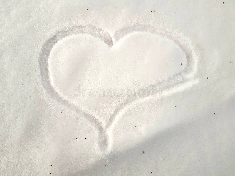 Heart drawn in white snow stock image. Image of farmland - 236254329