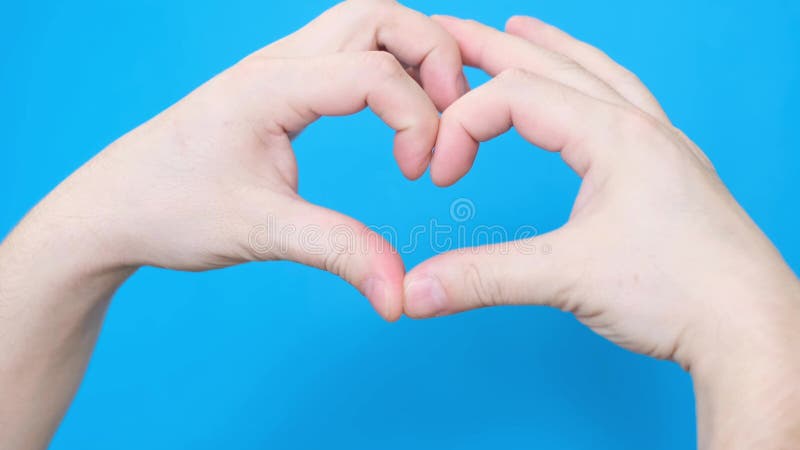 Heart Gestures Made by Hands on a Blue Background. Valentine& X27;s Day ...