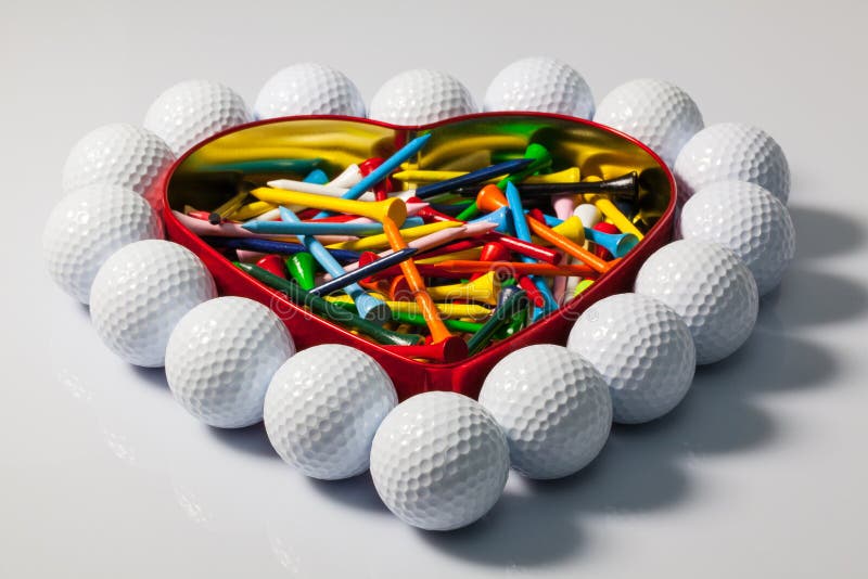 Heart of Golf Balls and Tees Stock Photo - Image of balls, table: 36958874