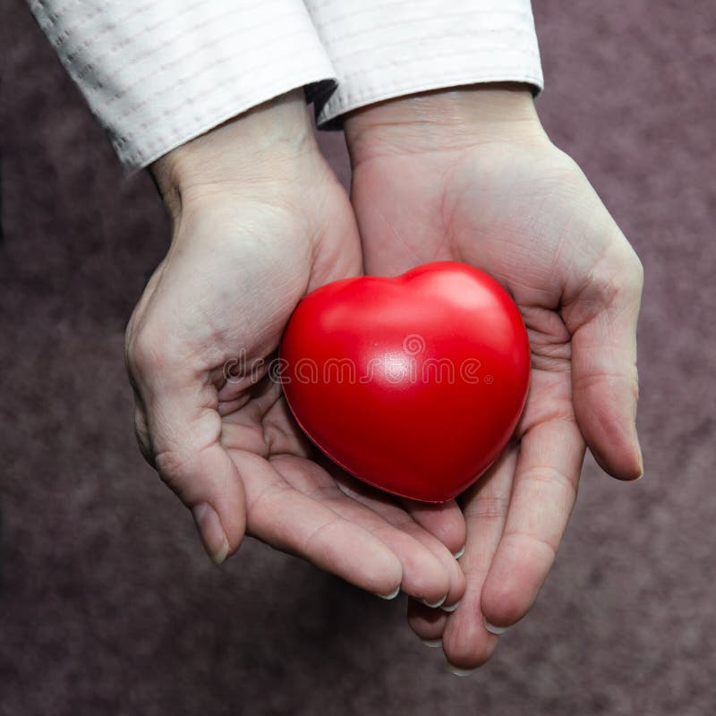 Heart in hand stock photo. Image of gift, give, black - 37914118