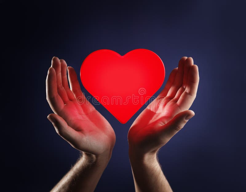 Heart and hands stock photo. Image of health, glowing - 22491580