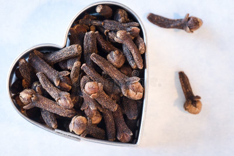 Whole Cloves in a Heart Shape Stock Photo - Image of heart, cuisine ...