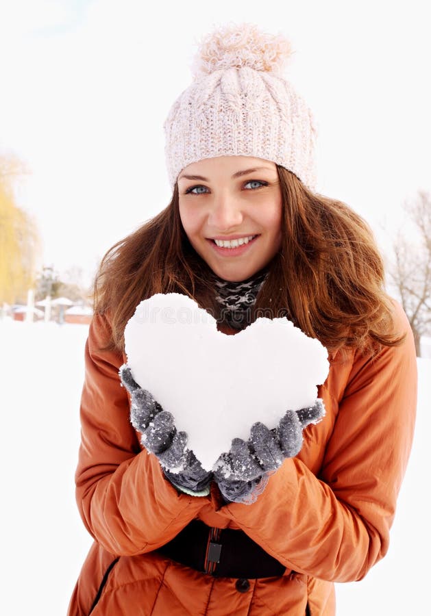 Heart of Ice in the Hands of Stock Image - Image of face, color: 34921531
