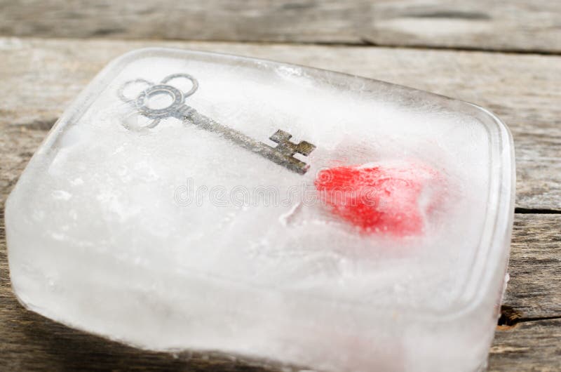 Heart and Key Frozen in a Block of Ice on the Old Boards Stock Photo ...