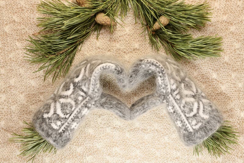 The Heart of Knitted Down Mittens with Ornament with Pine Branches on ...