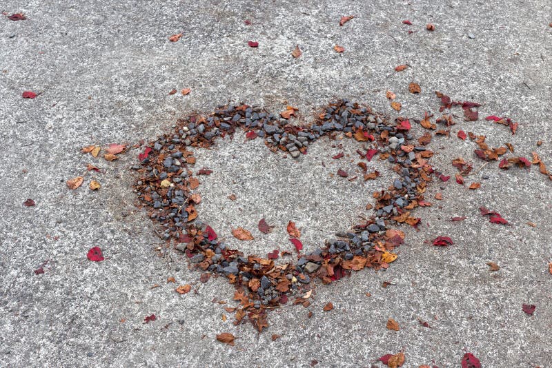 Heart Made of Rocks on Pavement Stock Image - Image of stones, leaves ...