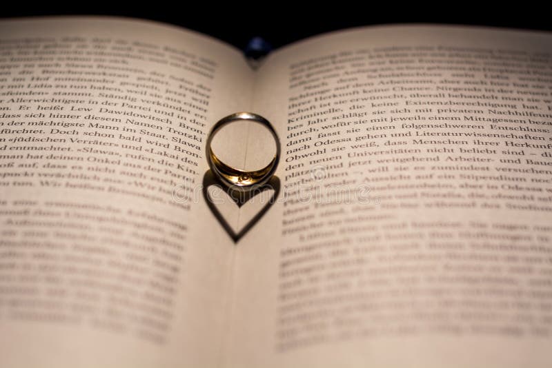A Heart Made from the Shadow of a Ring on a Blank Book with Line Stock ...