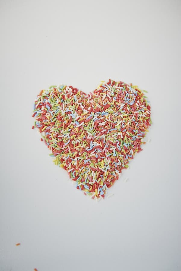 Heart Made of Sprinkles on White Background Stock Photo - Image of ...