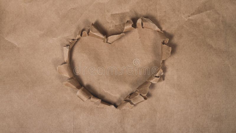 The Heart is Made of Torn Brown Paper. Background Stock Image - Image ...
