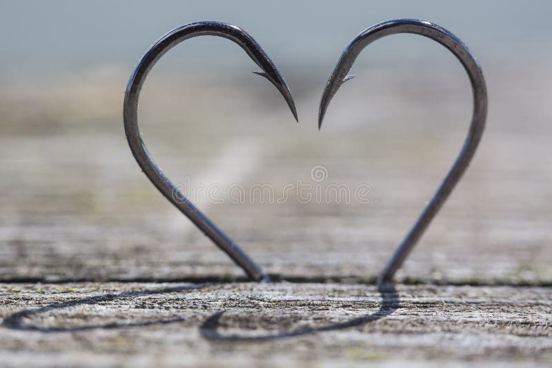 Heart Made of Two Fish Hooks Stock Image - Image of metal, form: 74157011